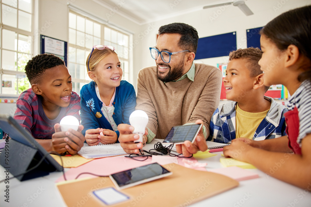 Teacher explaining solar panels functioning to elementary class Stock ...