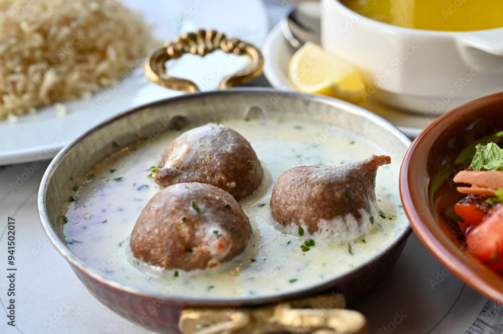 A traditional Lebanese dish of Kibbeh bil Laban, featuring tender ...
