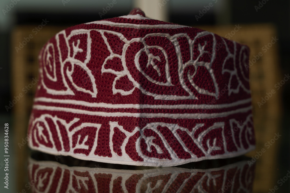 A traditional Omani cap in beautiful colors called kumma , which is ...