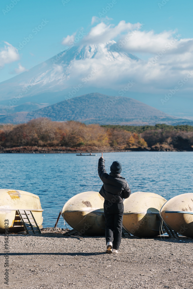 Woman tourist enjoy with Fuji Mountain at Lake Shoji, happy Traveler ...