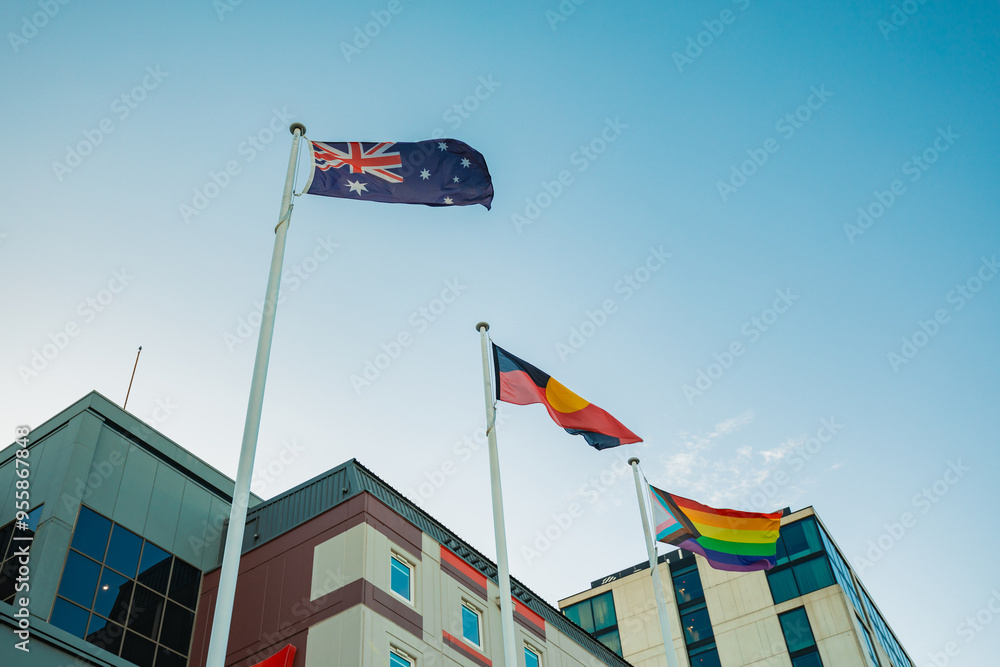 Australian, Aboriginal and LQBTQ+ pride flags flying outside buildings ...