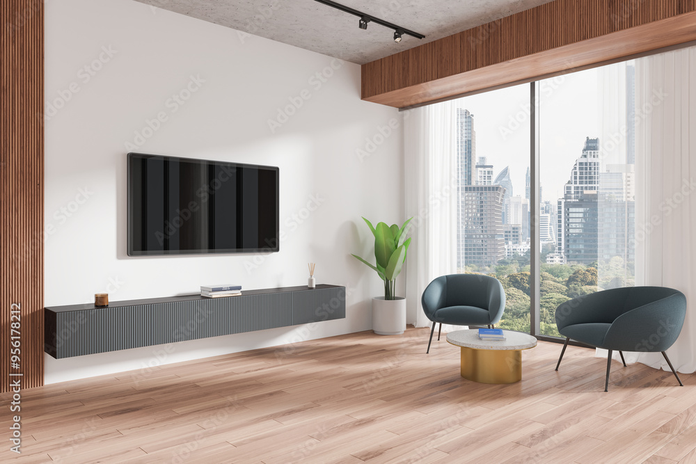 Stylish home living room interior with armchairs and tv screen ...