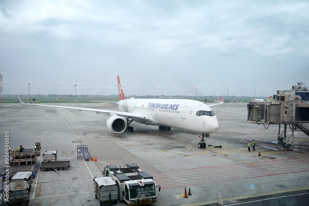 Jakarta, Indonesia - December 10, 2023: A Turkish Airlines plane docks ...
