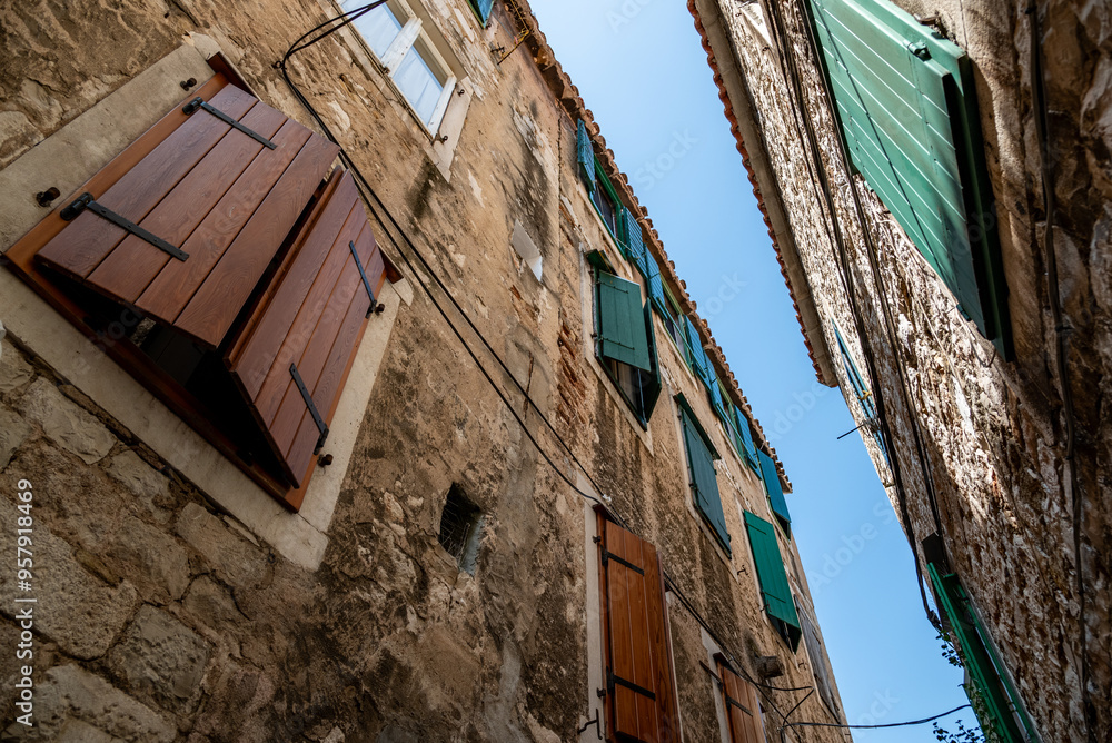 Narrow street in the Roman Historical Complex of the Palace of ...