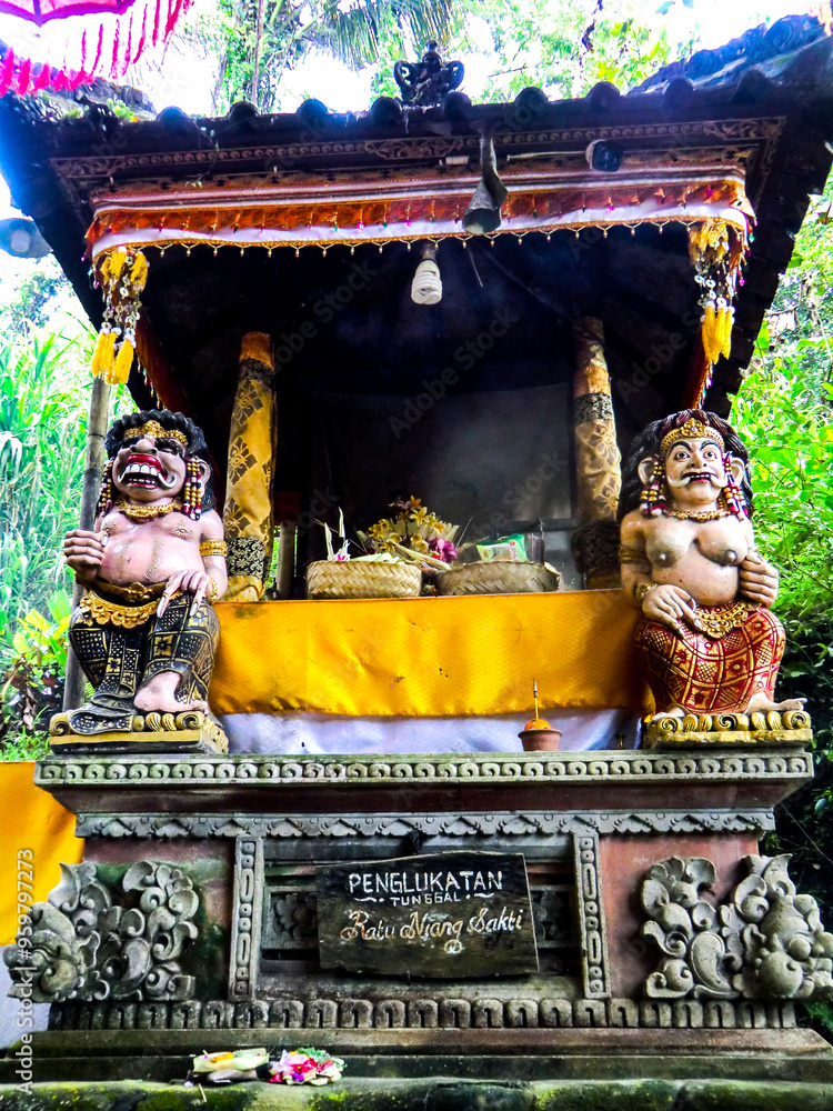 BALI - Balinese God statue in temple complex Taman Beji Griya Waterfall ...