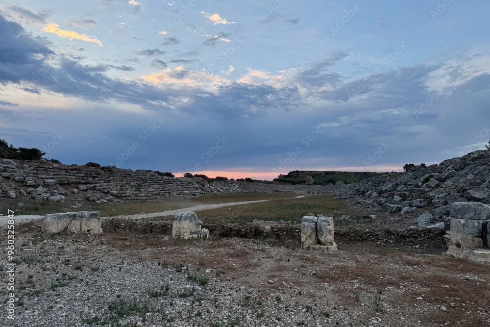 Ruins amphitheater sports arena gymnasium coliseum of ancient city in Türkiye, stone tribune ...