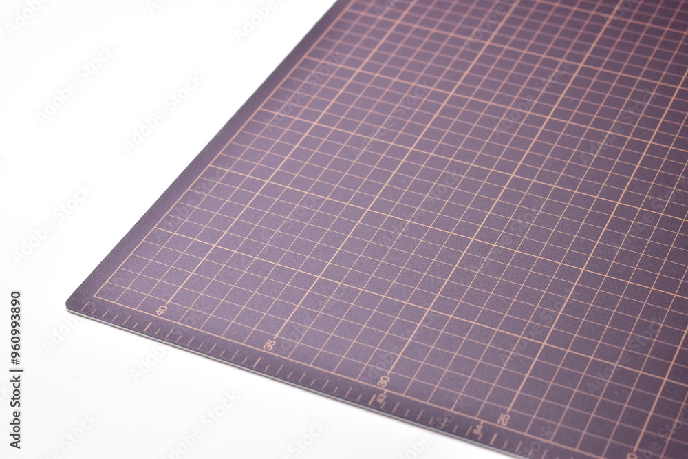 black cutting mat board on white background with line and scale measure ...