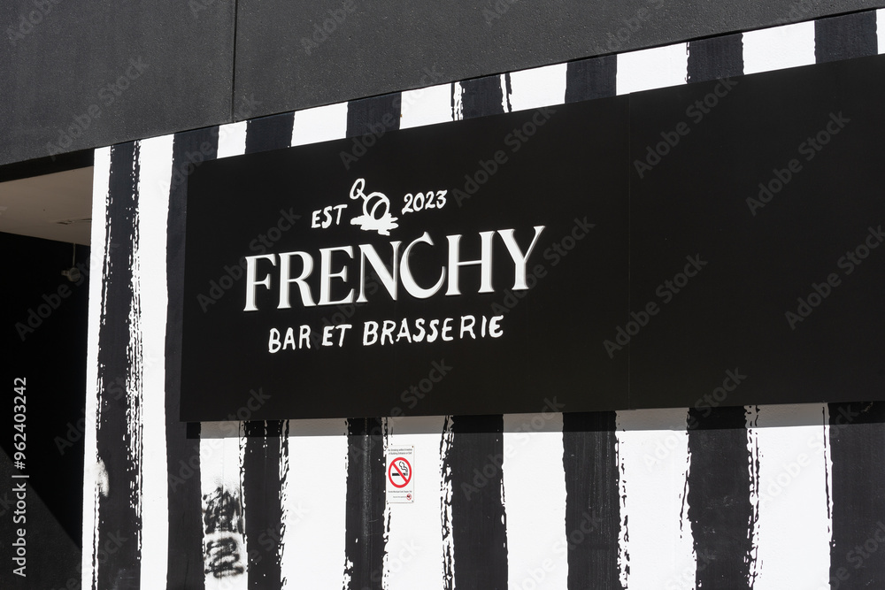 sign outside Frenchy Bar et Brasserie, a French restaurant, located at ...