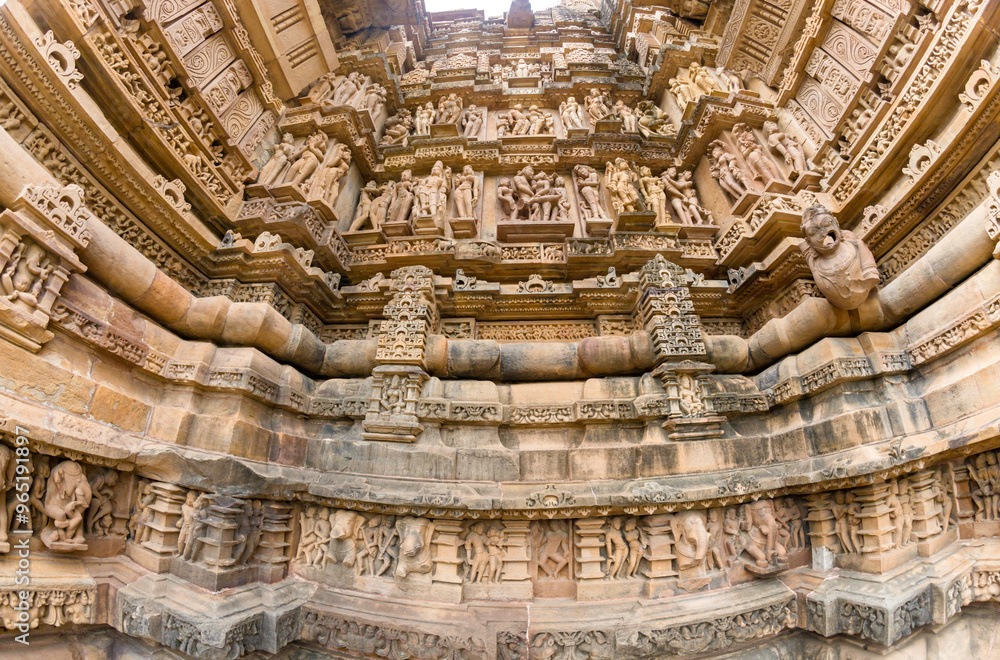 Exotic sculptures on the wall of mahadev mandir in khajuraho, madhya ...