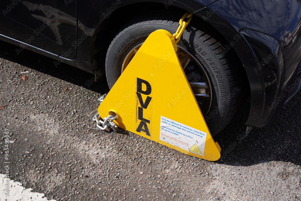 Southampton UK 8 September 2024 - A untaxed car with DVLA wheel clamp ...