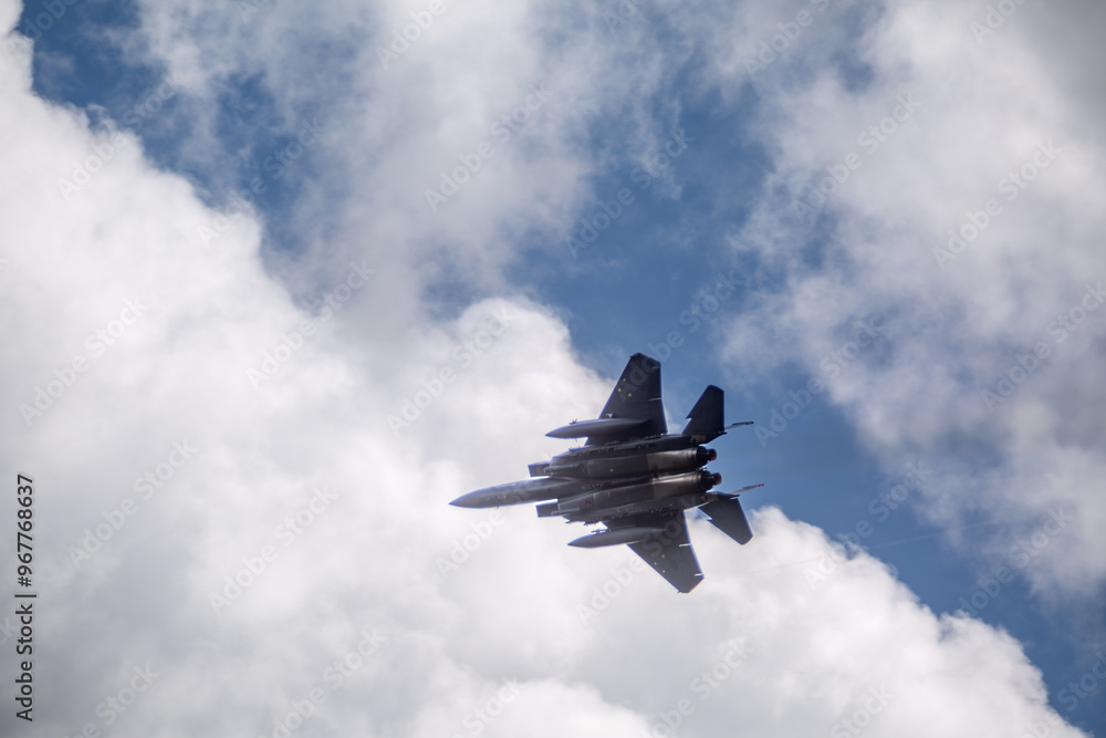 F15 fighter jet taking off with landing gear up, Captured from a public ...