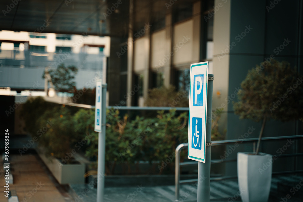 A parking sign with the letter P indicates parking available for ...