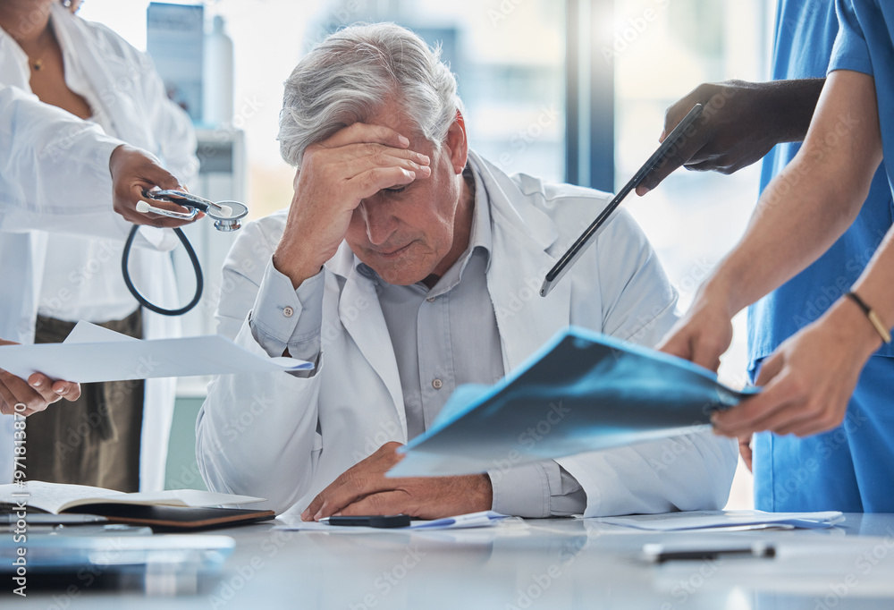 Mature, doctor and stress of team in office with multitasking, time ...