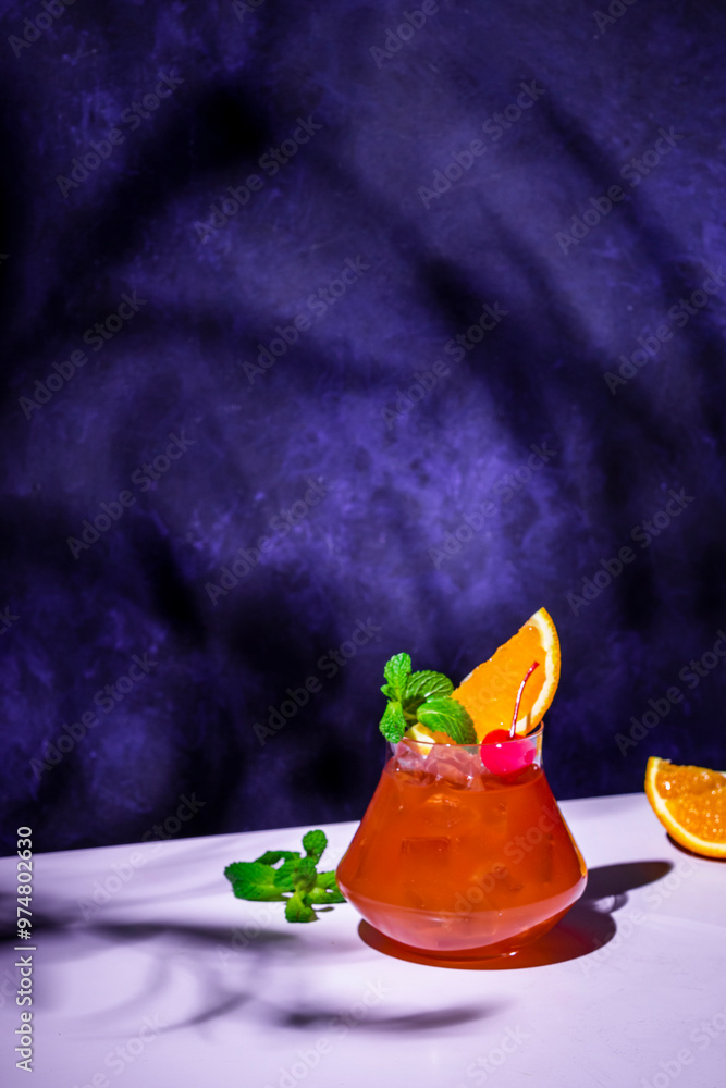 Red orange alcoholic cocktail drink with rum, pineapple juice, syrop ...