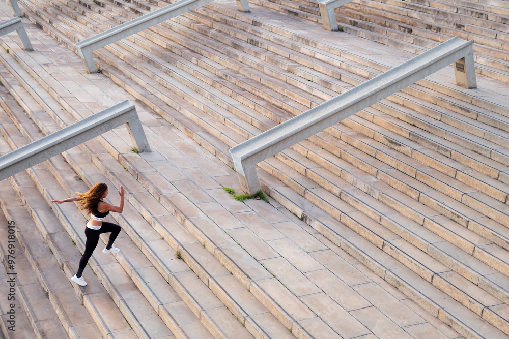 high angle side view of unrecognizable fast runner in sportswear ...