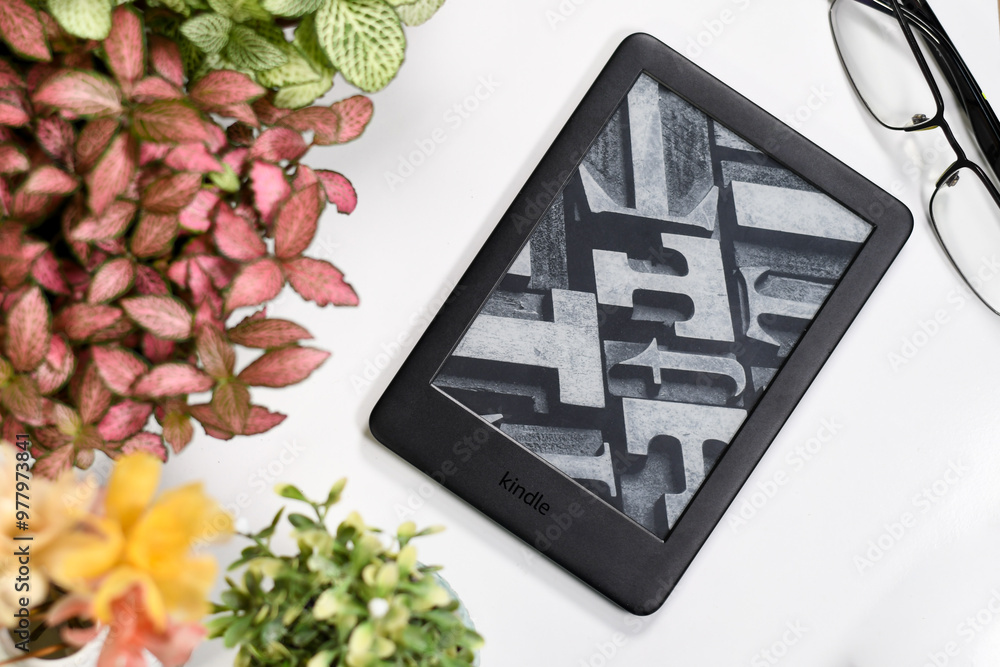 E-Reader Kindle with a flowers and white background. Amazon product ...