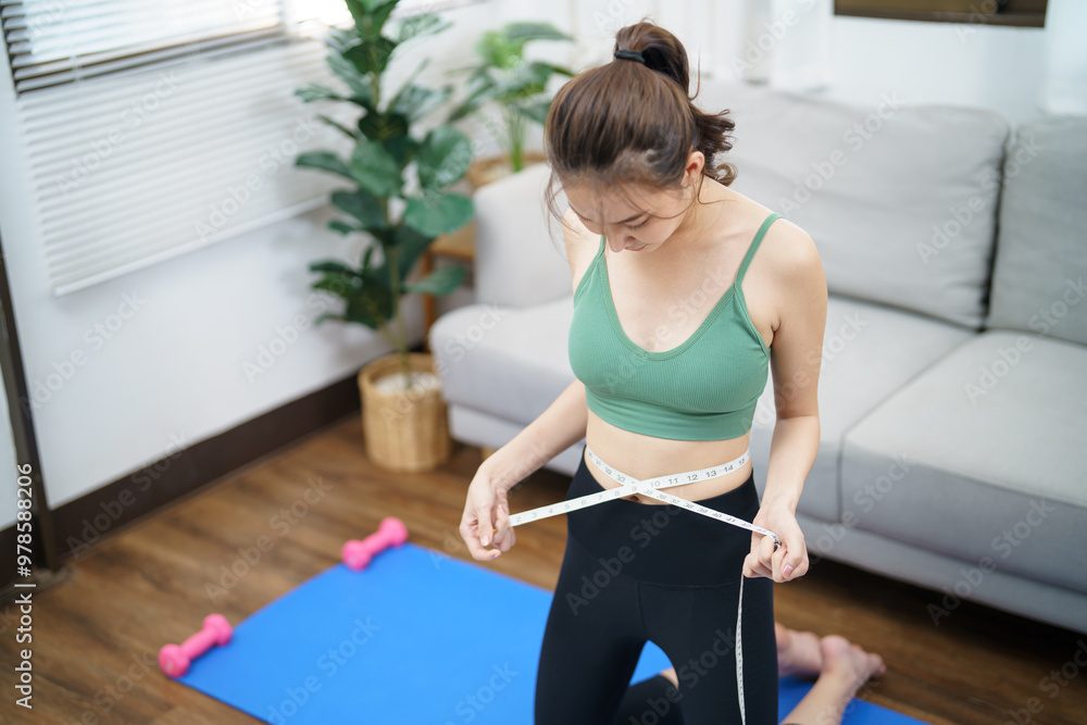 Asian woman with anorexia with measuring tape feeling unhappy. Anorexia ...