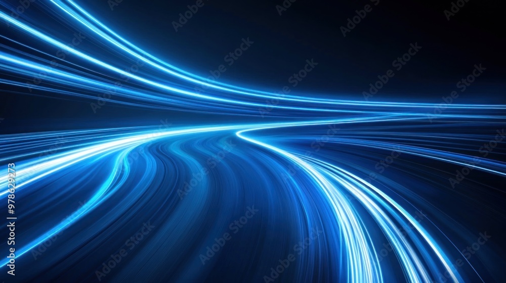 Bright blue light trails swirl and flow smoothly across a dark backdrop ...
