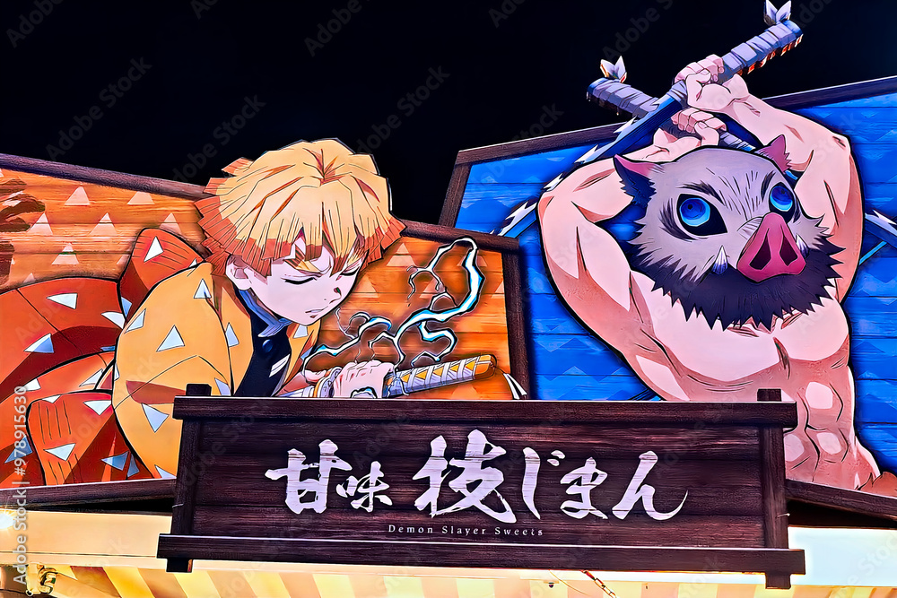 photo of a sign announcing the limited-time Demon Slayer attraction at ...