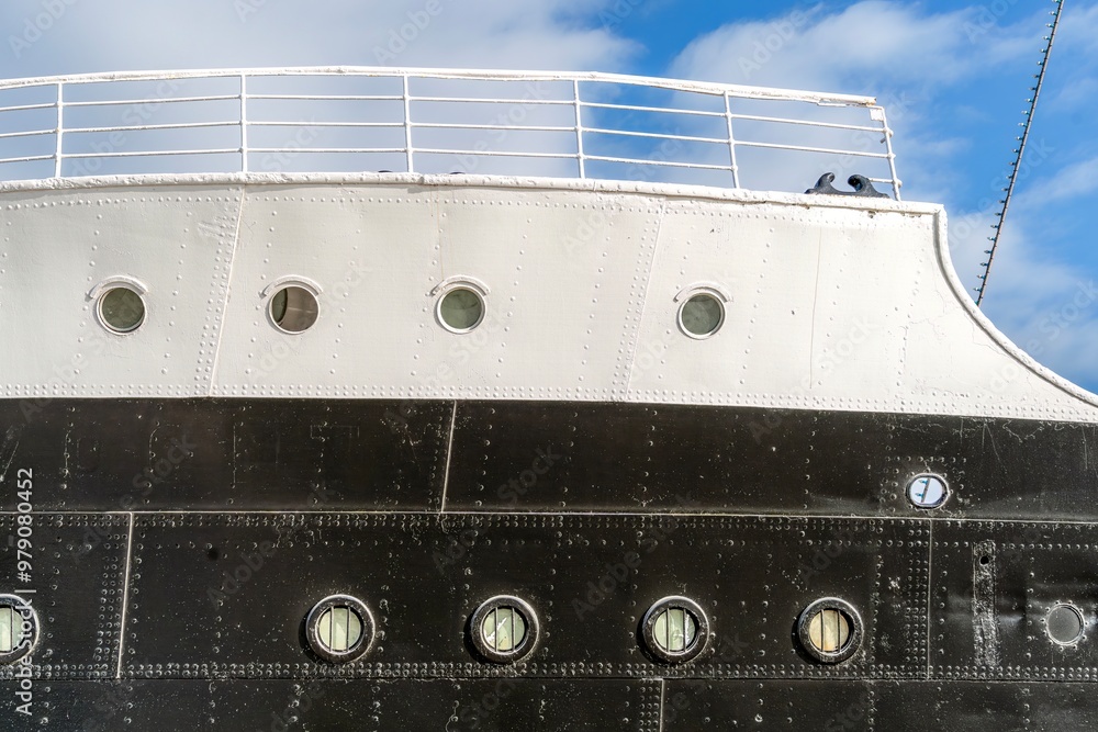 View Of The Side Of An Old Ship With Black And White Riveted Metal ...