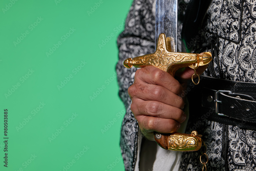 Traditional Saudi out-feet on chromakey. Arabian long saber - saif ...
