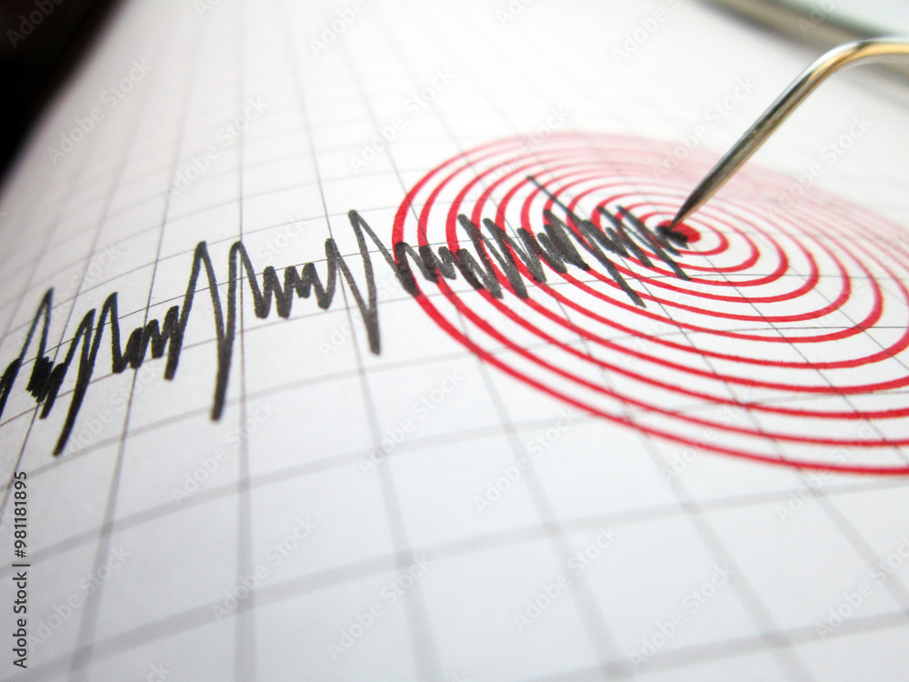 Low and High Earthquake Waves on Richter scale vibrating on white paper ...