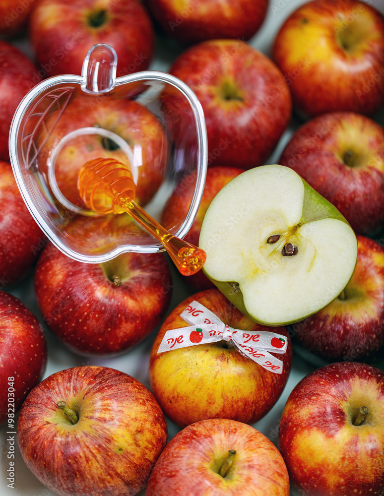 Clear apple shaped plastic container with a honey dipper inside, ribbon ...
