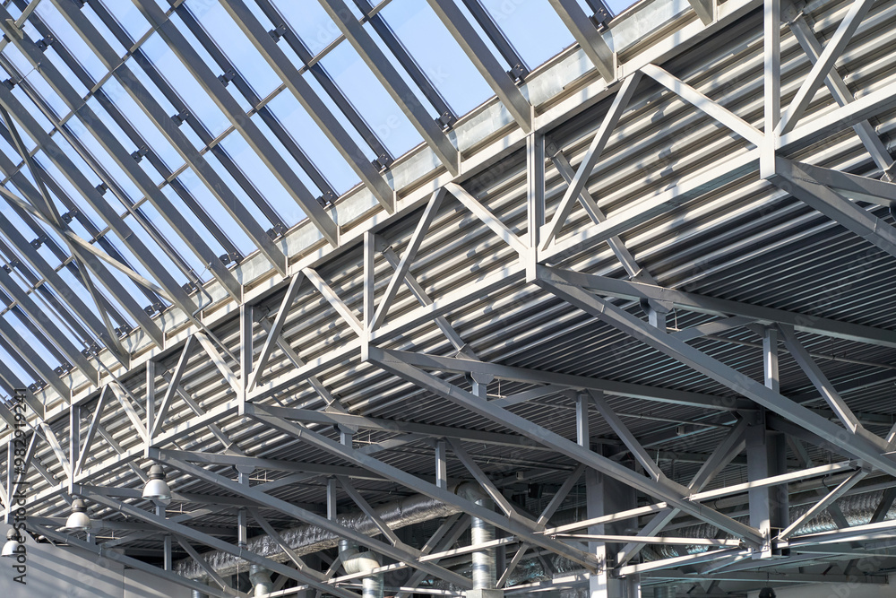 Modern architectural ceiling design with steel beams and glass panels ...