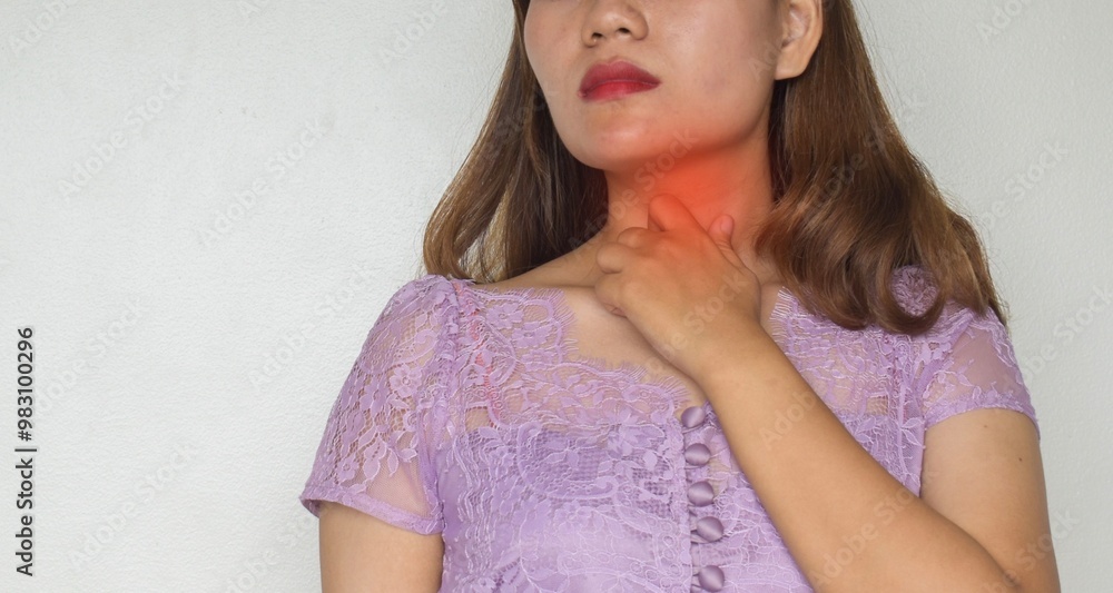 Asian woman with neck pain. Concept of sore throat, pharyngitis ...