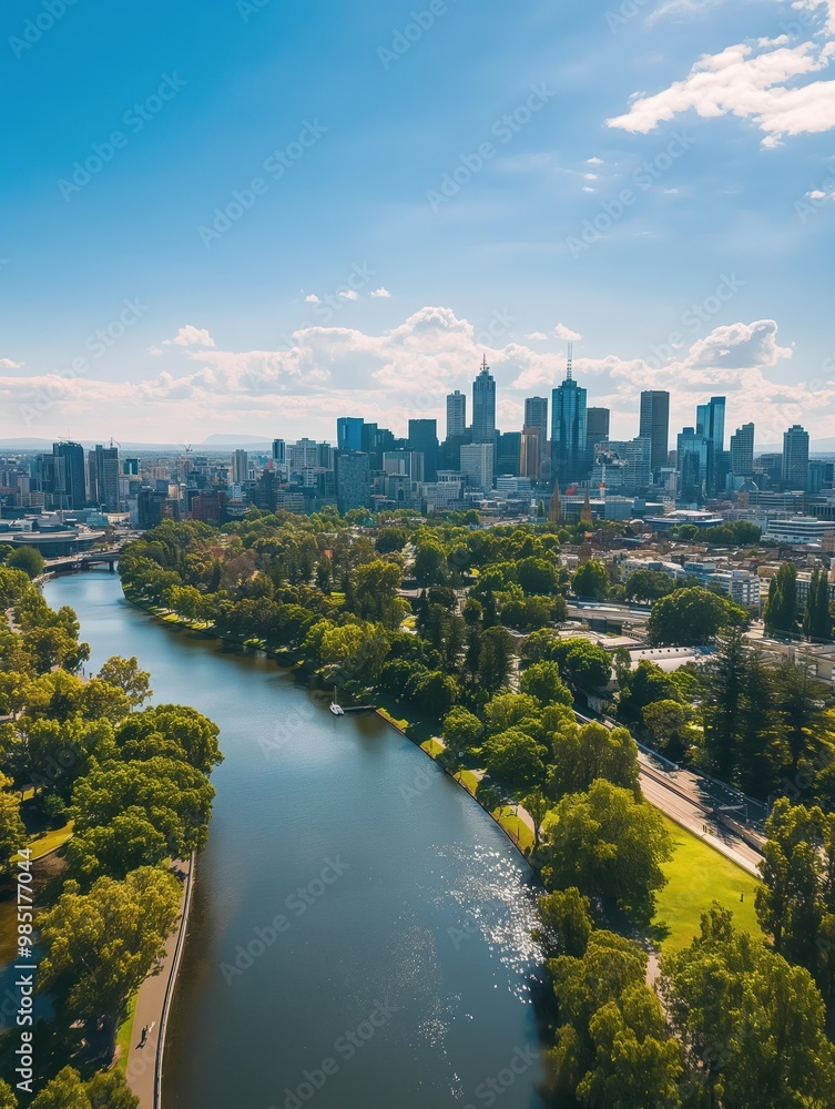 Melbourne cityscape from above with river, green trees on sunny day ...