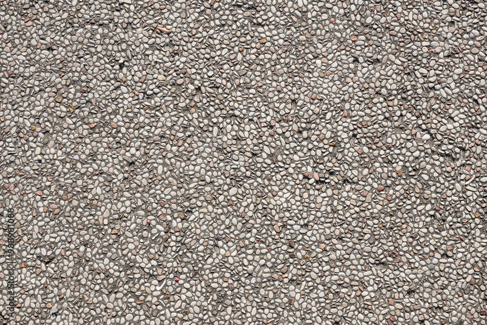 A high-resolution image of a seamless texture of small grey pebbles ...