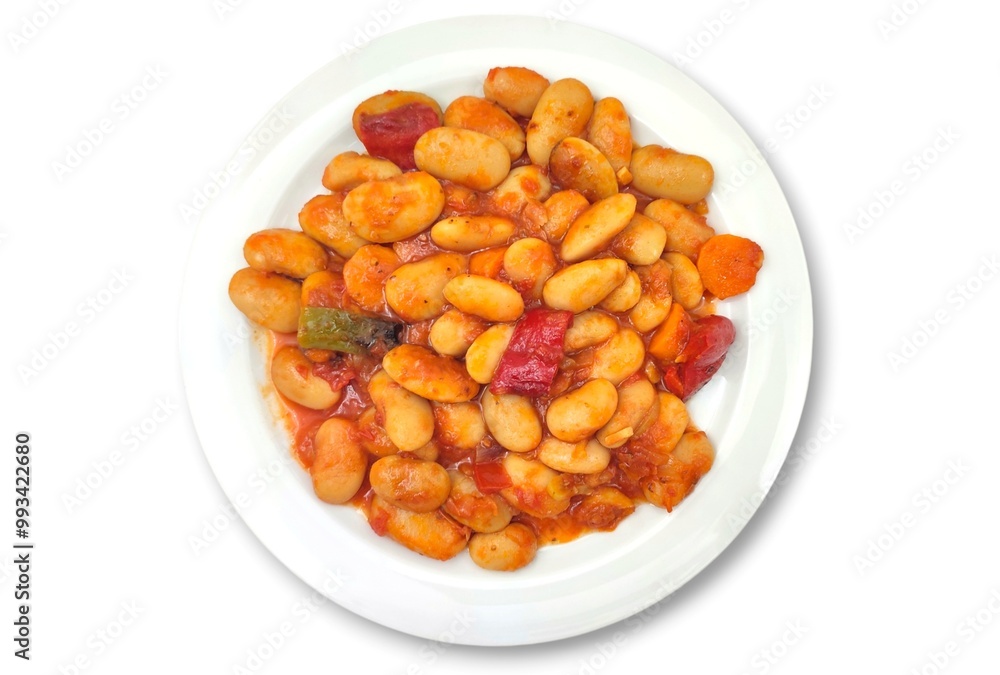 Top view of a delicious plate of Greek baked giant beans (gigantes ston ...