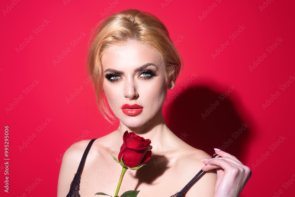 Beauty studio portrait. Beautiful model with red rose flower, isolated ...