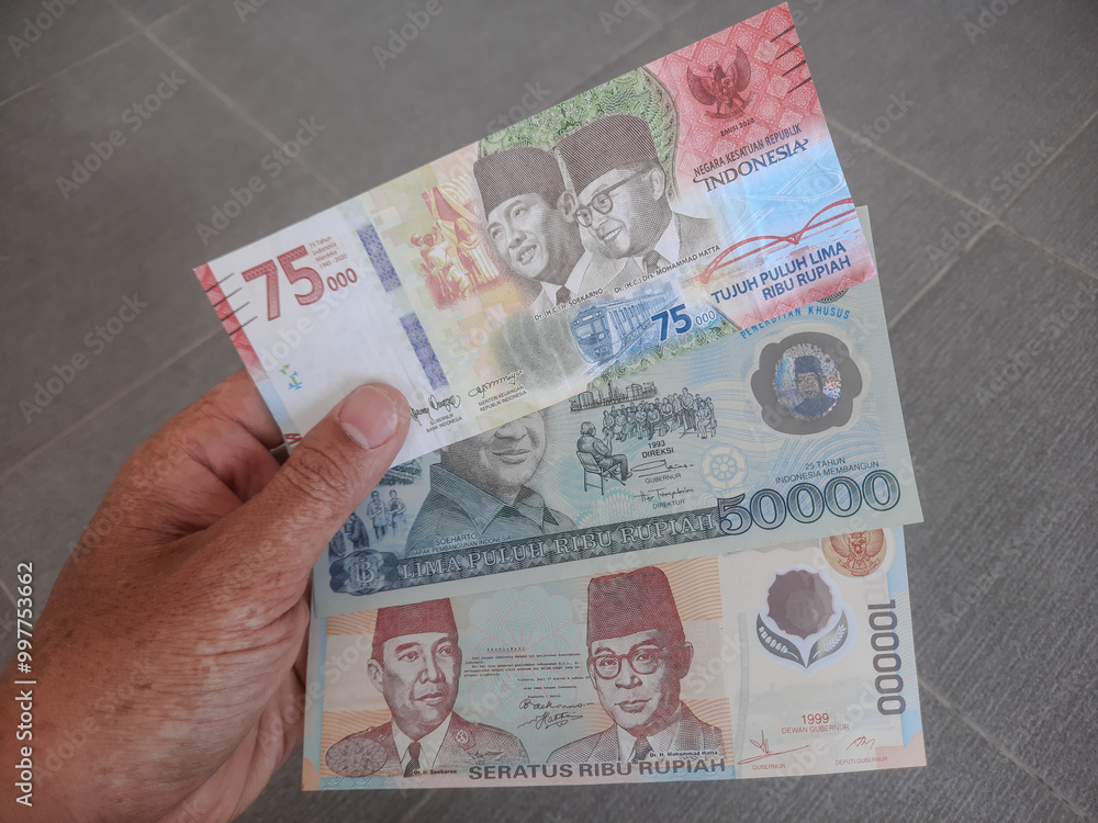 Three types of special edition Indonesian rupiah banknotes with ...