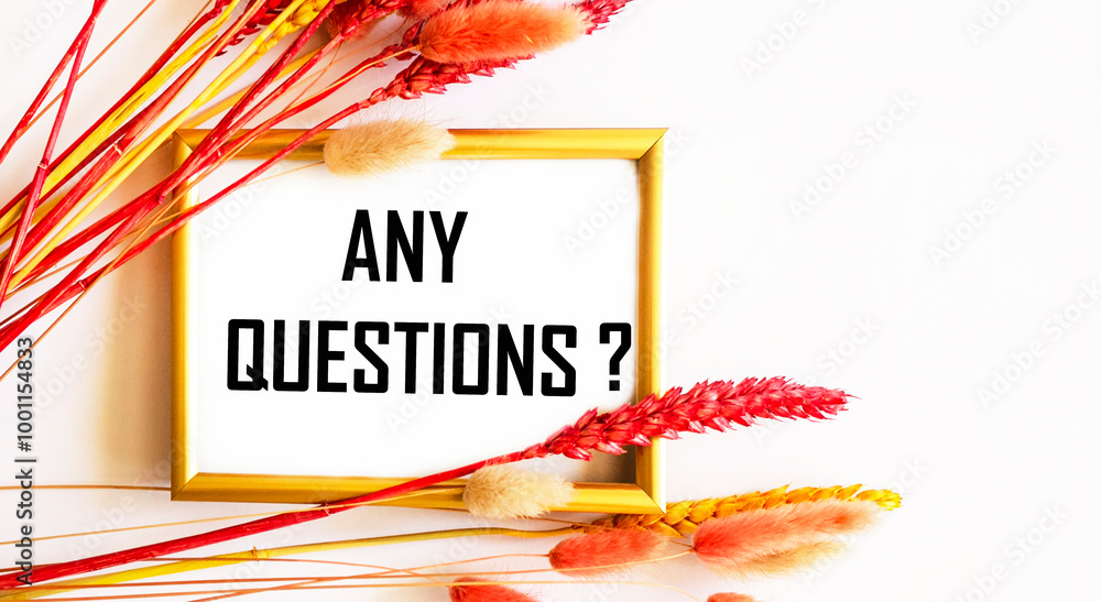 Text ANY QUESTIONS in a gold frame on a white background with an autumn ...
