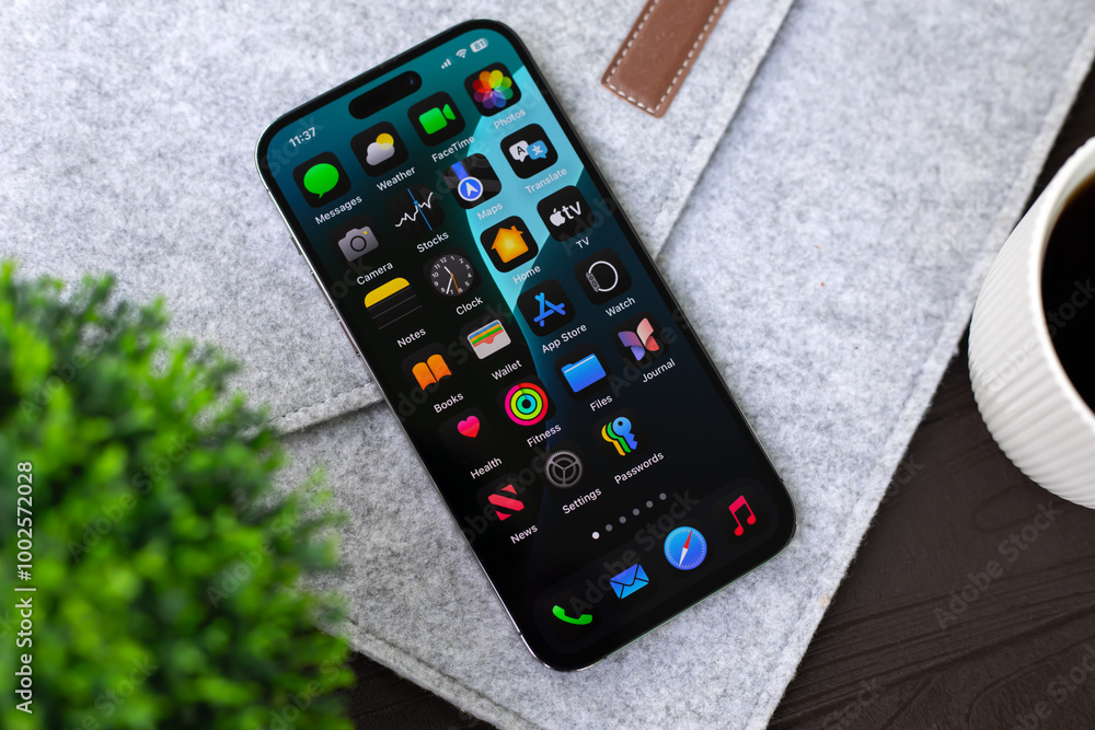 Apple iPhone 15 Pro Max with home screen IOS 18 Stock Photo | Adobe Stock