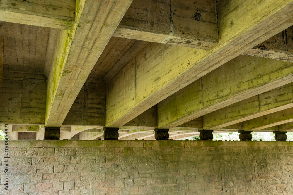 Beam and slab concrete road bridge seen from below. Standard precast ...