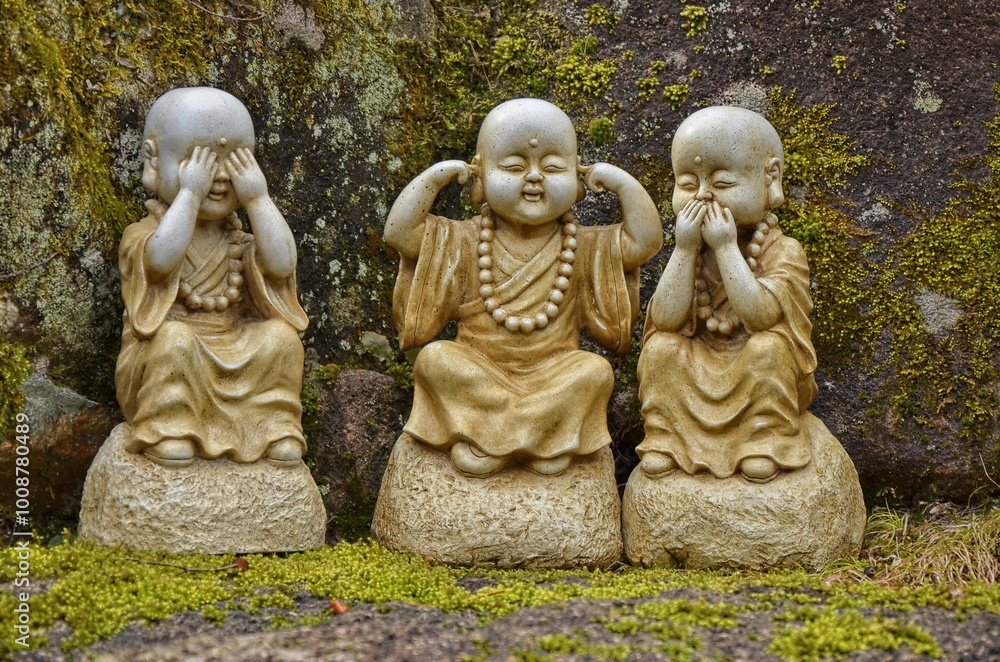 Cute buddhist statues called: "See no evil, hear no evil, speak no evil ...