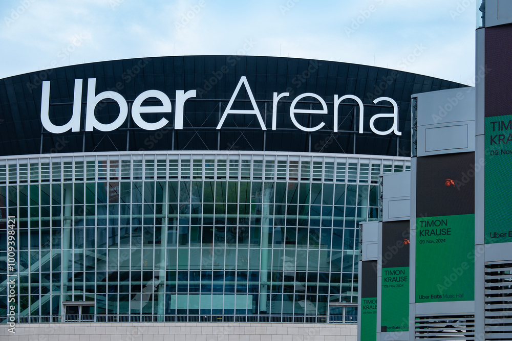 Uber Eats Music Hall Advertising logo on modern building facade, fusion ...