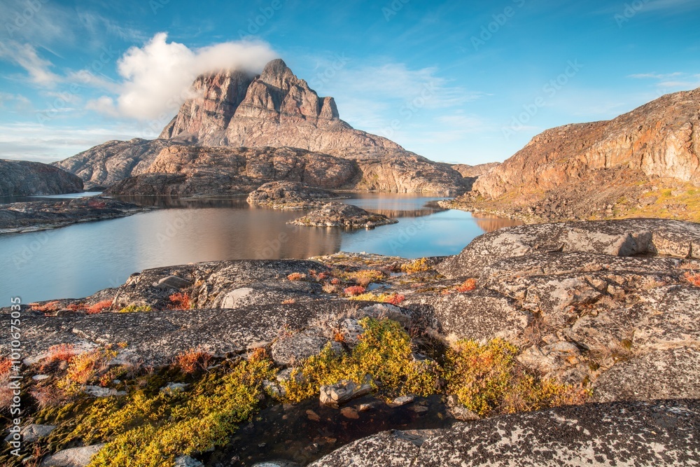 Mountains and lake in Uummannaq during summer time, Greenland. Located ...