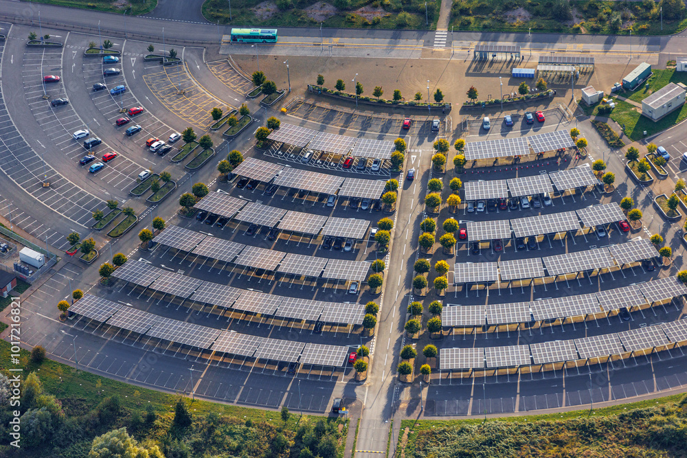 Aerial view of UK park and ride with solar roof panels, promoting ...