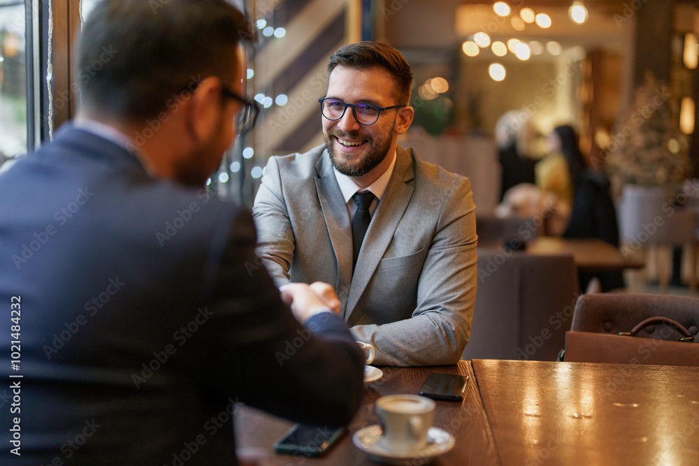 Professional Handshake Between Businessmen in Cafe Stock Photo | Adobe ...