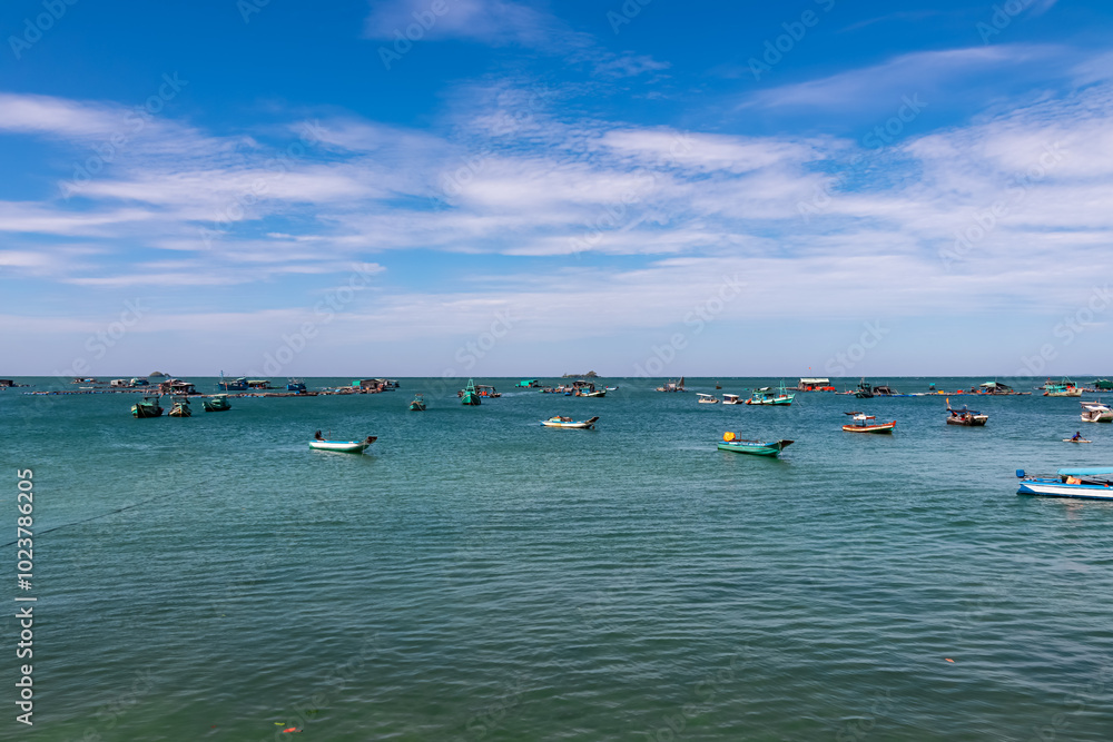 Colorful fishing boats are anchored in Rach Vem lagoon on Phu Quoc ...
