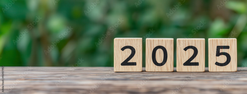 image features four wooden blocks arranged to display year 2025, set ...