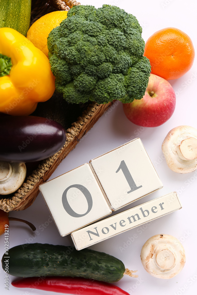 Fresh vegetables, fruits and cube calendar with date NOVEMBER 1 on ...