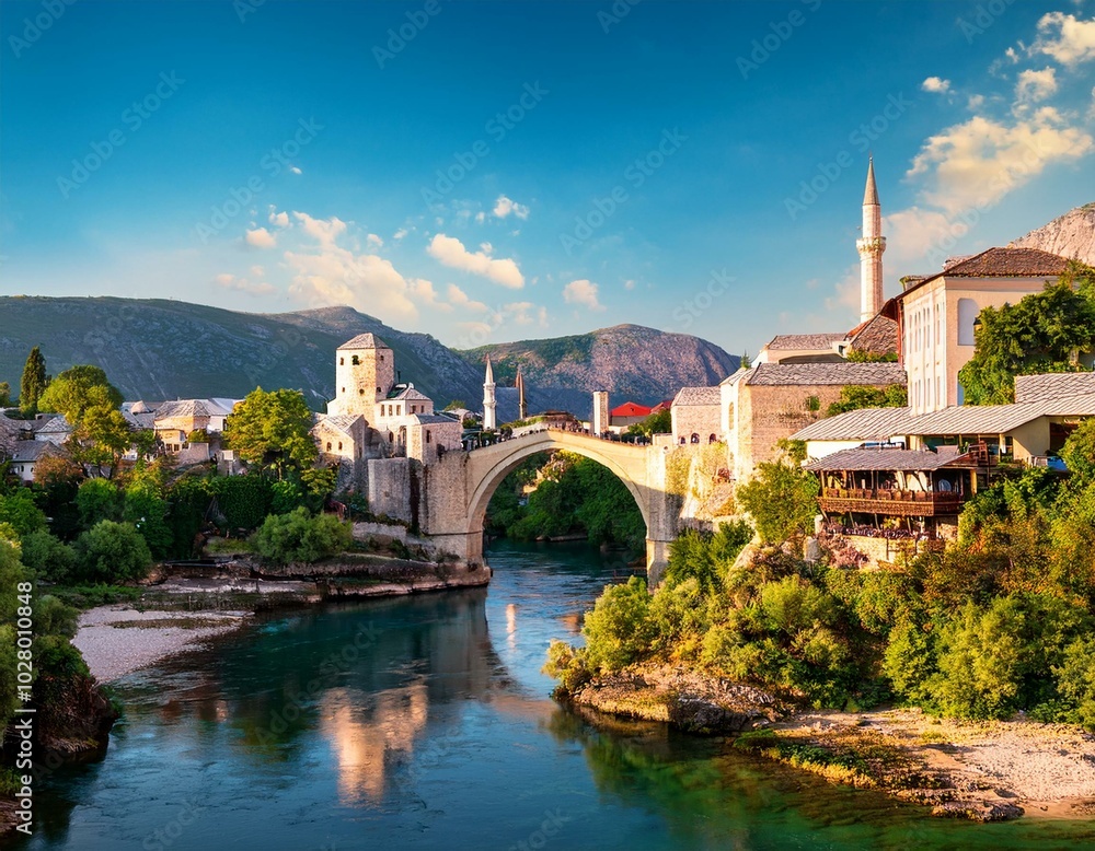 fantastic skyline of mostar with the mostar bridge houses and minarets ...