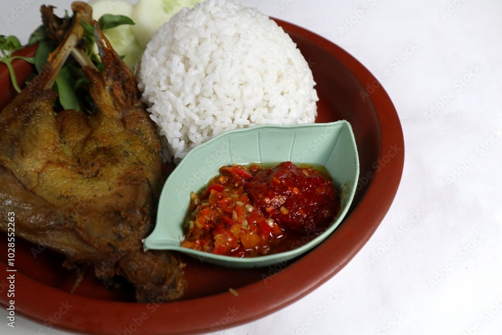 Penyet ayam or fried chicken in Indonesia is the name of a typical ...