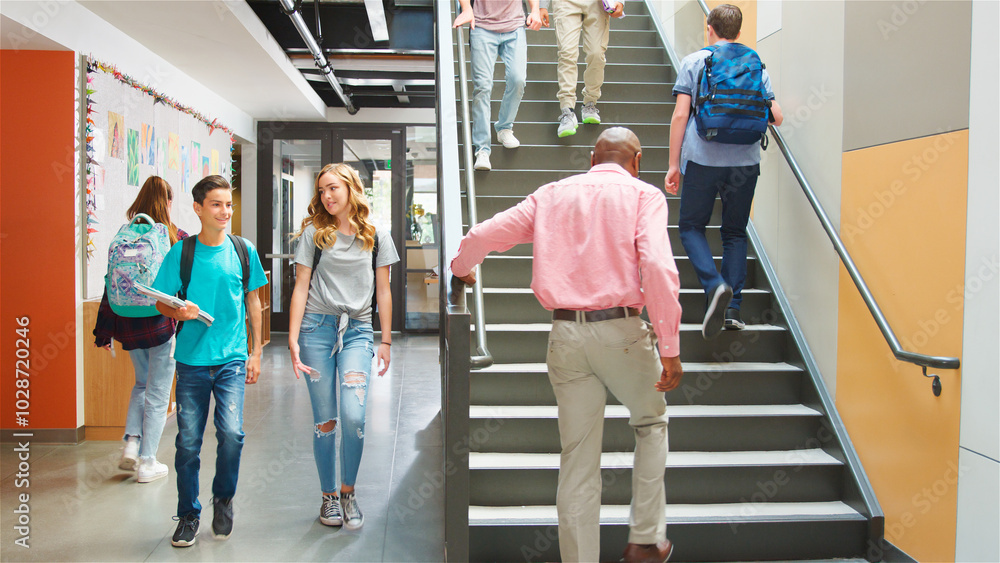 High School Students And Staff In Corridor Leaving Classrooms At The ...