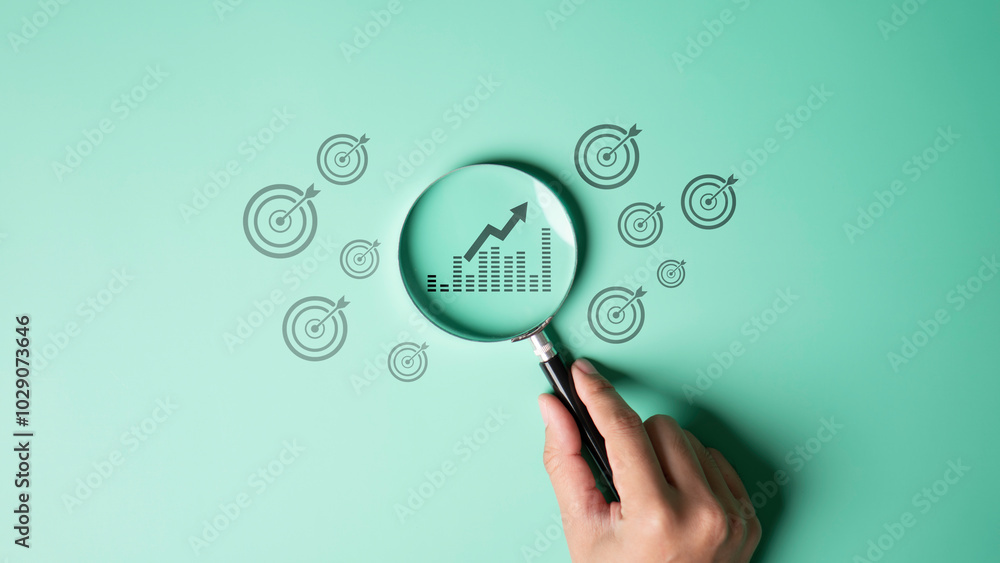 Magnifying glass focus to target concept. business investment ...