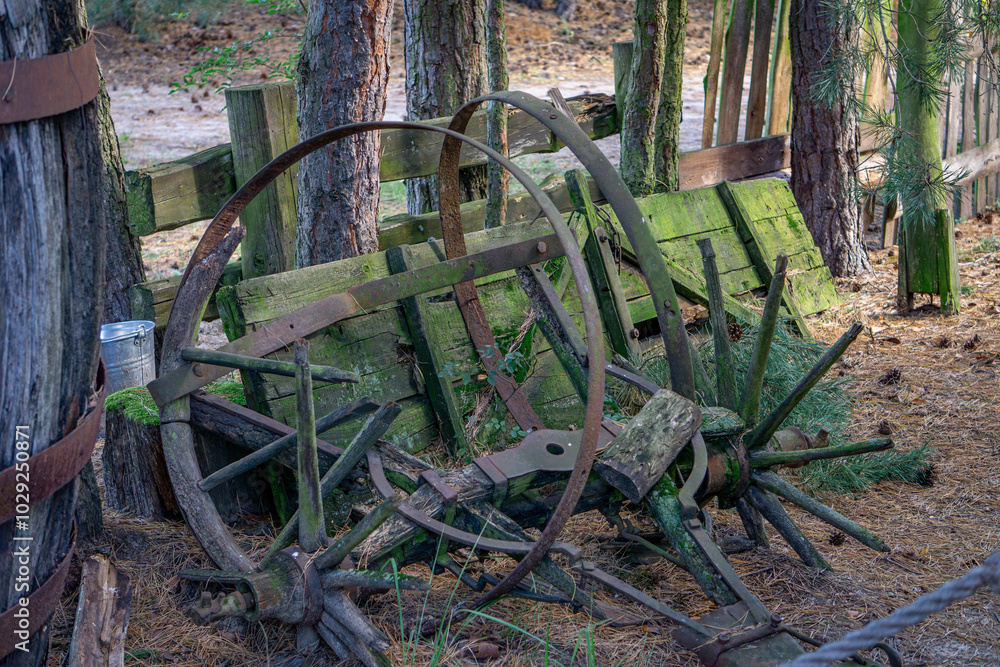 old horse cart axle with wooden wheels. axle of a horse cart. Stock ...